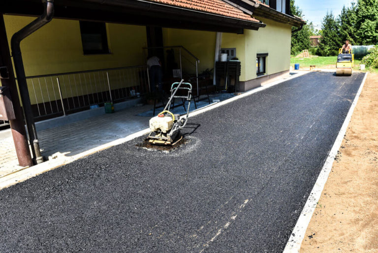 What Are the Best Practices for Edging an Asphalt Driveway?